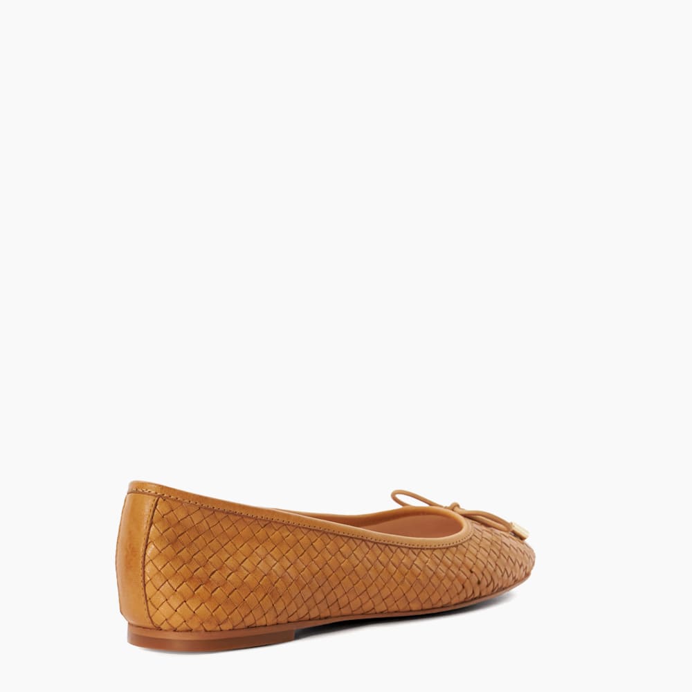 Tan flat pumps store